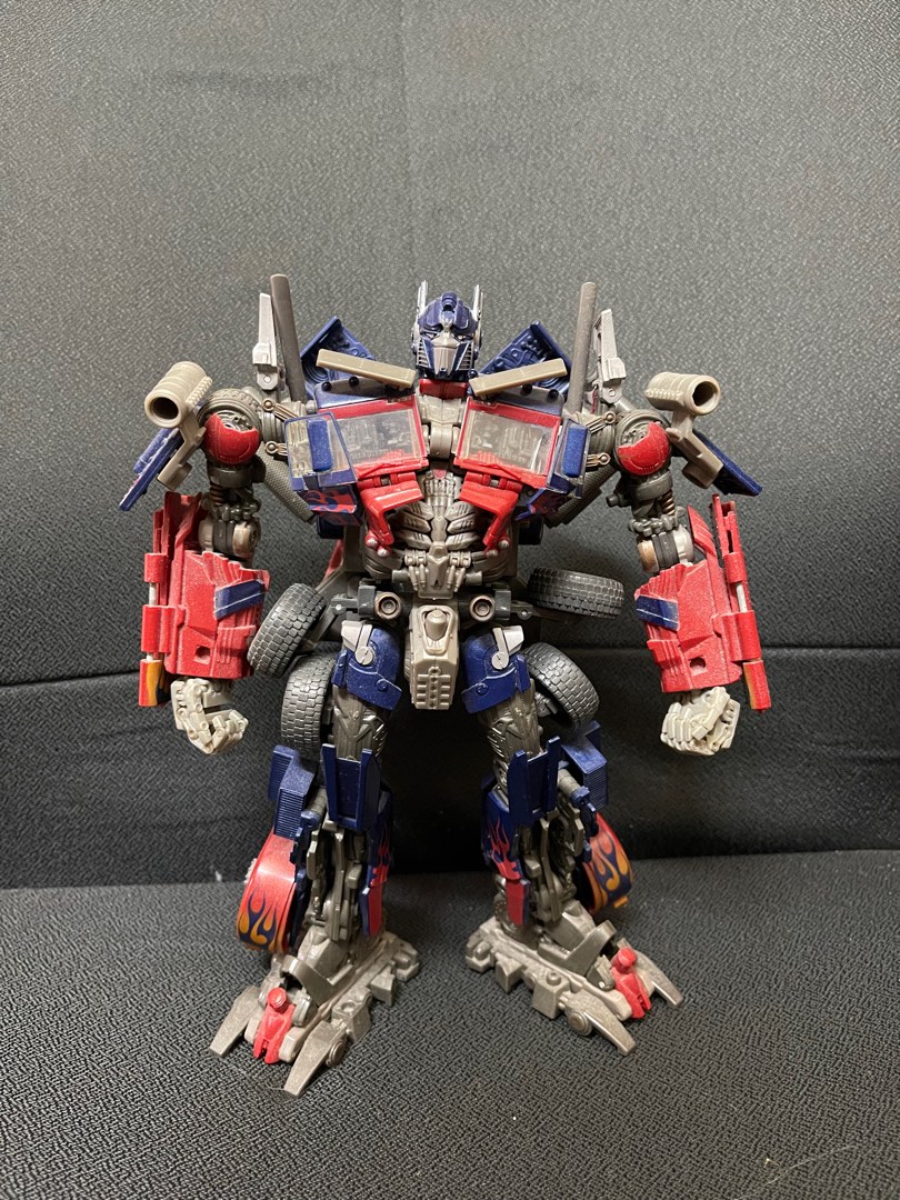 Two Generations Of Dotm Leader Class Optimus Prime Combined, 52% OFF
