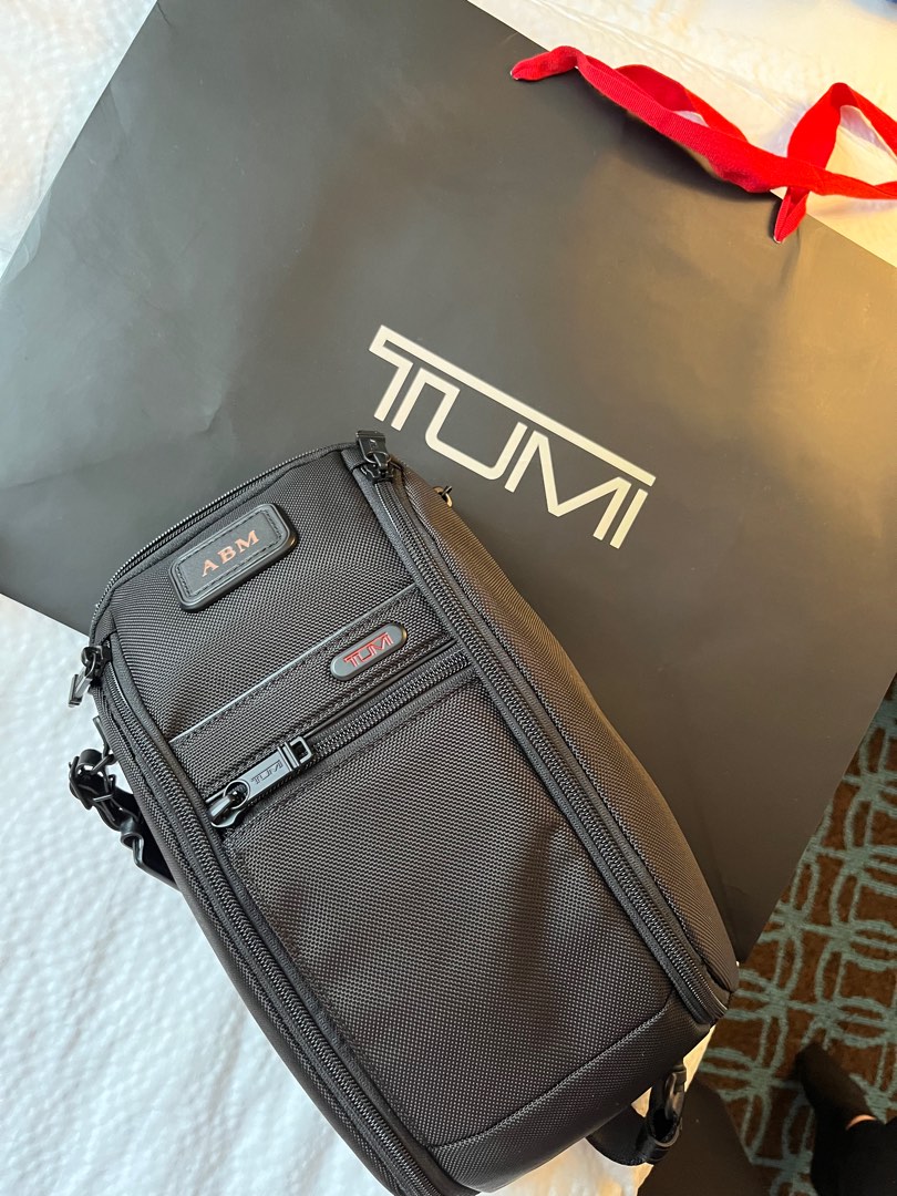 Original large tumi sling bag on Carousell