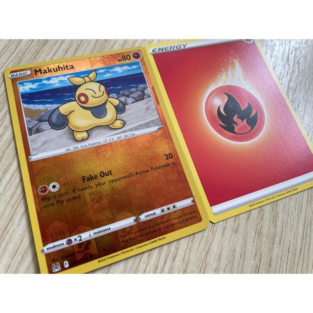 Reverse Holofoil Pokemon Makuhita + Fire Energy, Hobbies & Toys, Toys & Games on Carousell