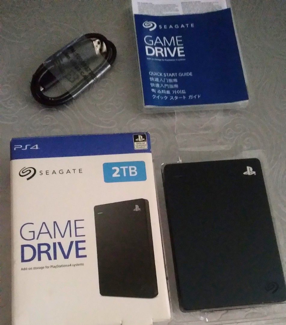 Seagate PS4 Game Drive 2TB | Complete with original usb cable, manual ...