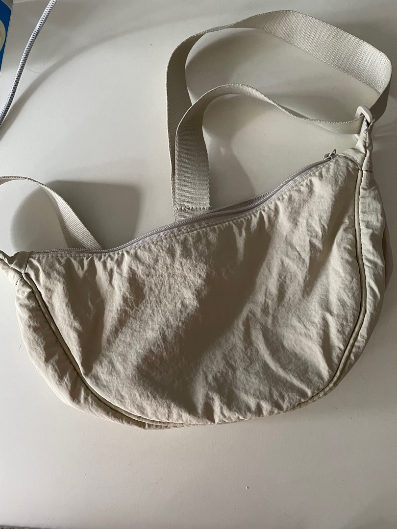 Uniqlo round mini shoulder bag, Women's Fashion, Bags & Wallets, Cross ...