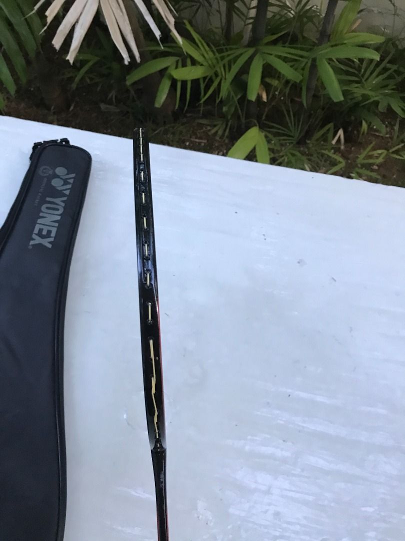 Yonex Titanium badminton racket with racket bag. In good condition ...