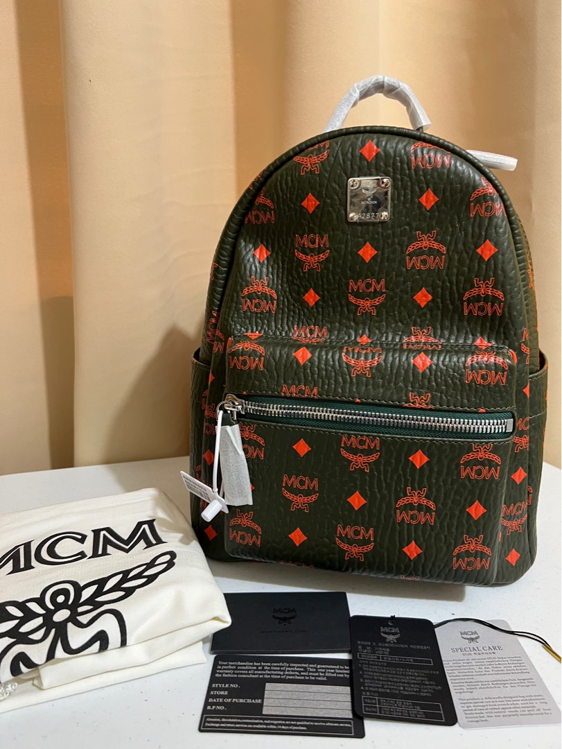 MCM backpack with Red MCM print, Luxury, Bags & Wallets on Carousell