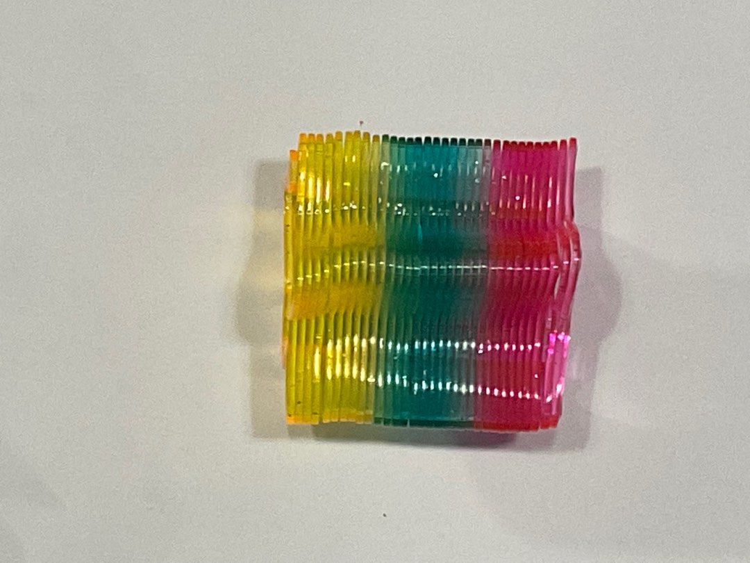 Star Shaped Slinky (Rainbow), Hobbies & Toys, Toys & Games on Carousell