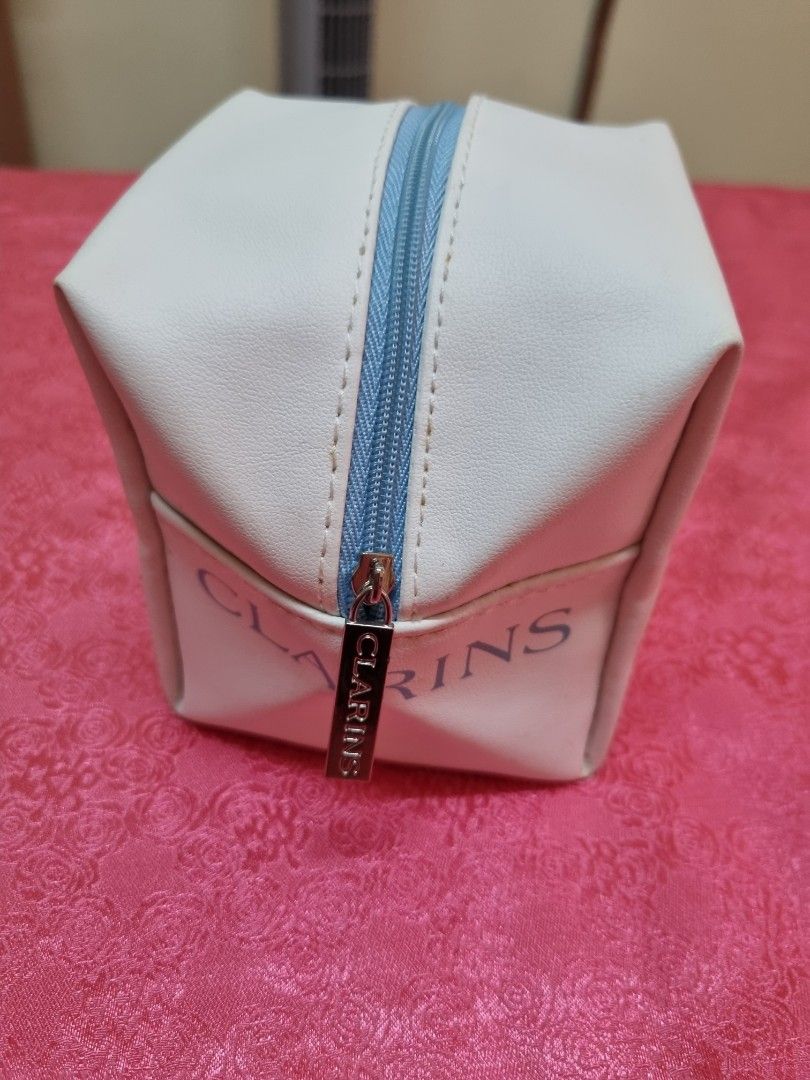 Clarins cosmetics pouch, Women's Fashion, Bags & Wallets, Purses ...