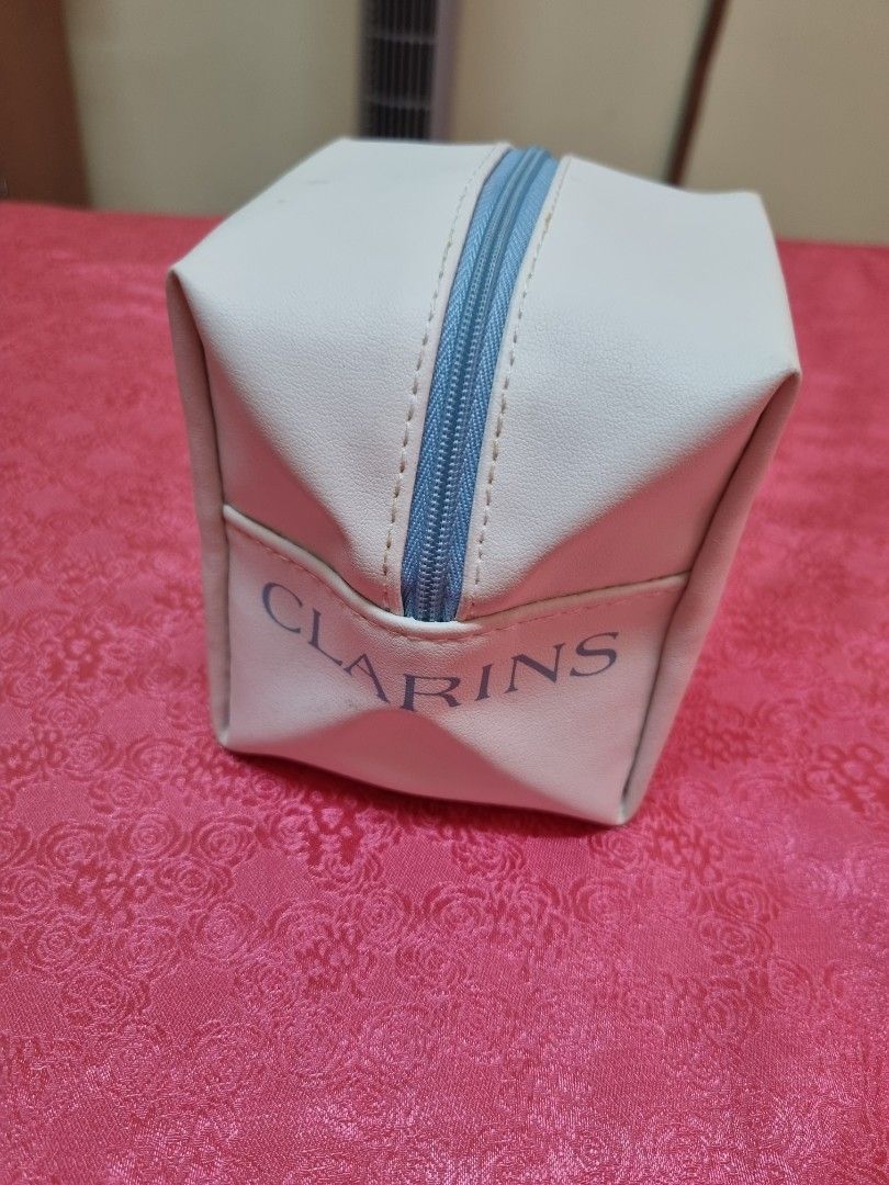 Clarins cosmetics pouch, Women's Fashion, Bags & Wallets, Purses ...