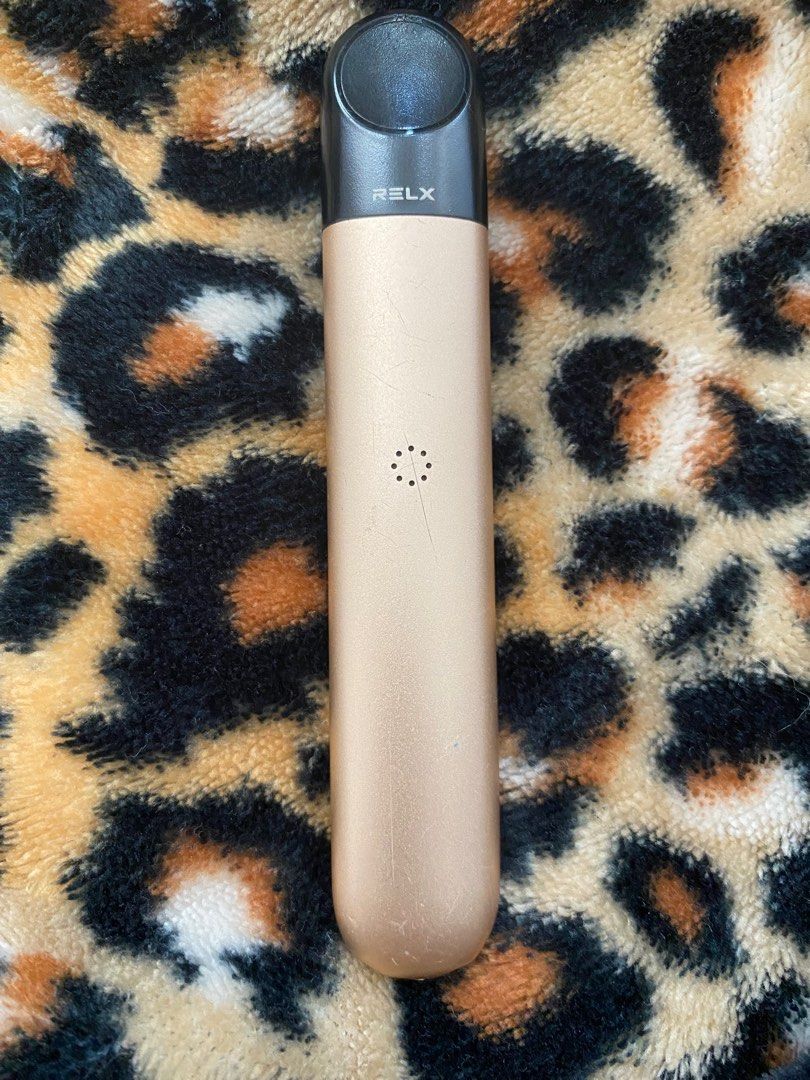 Relx infinity gold device on Carousell
