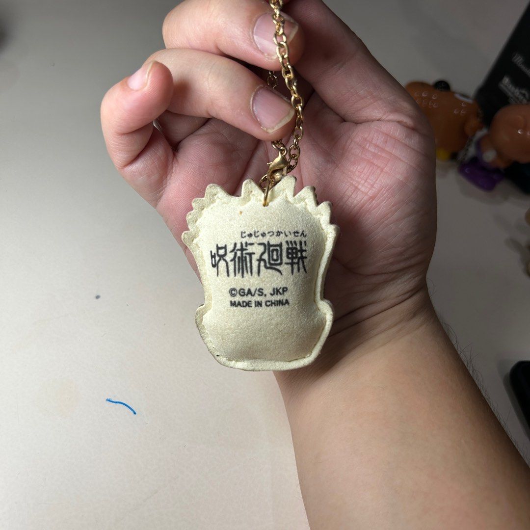 Satoru gojo keychain jiujutsu kaizen on Carousell