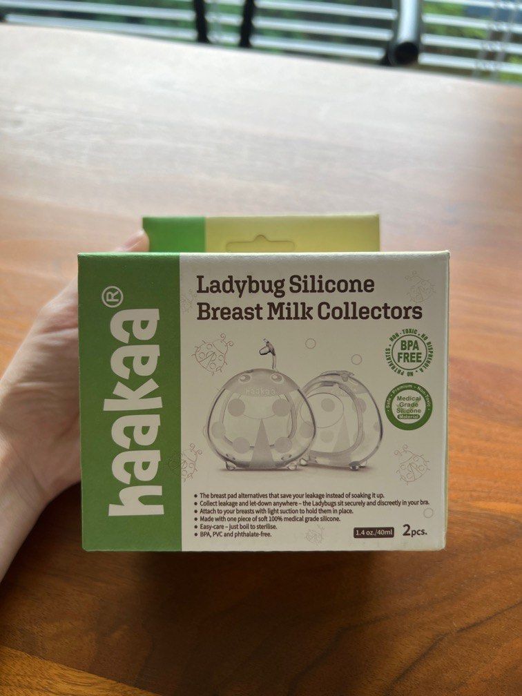 BNIB Haakaa ladybug silicone breast milk collectors, Babies & Kids ...