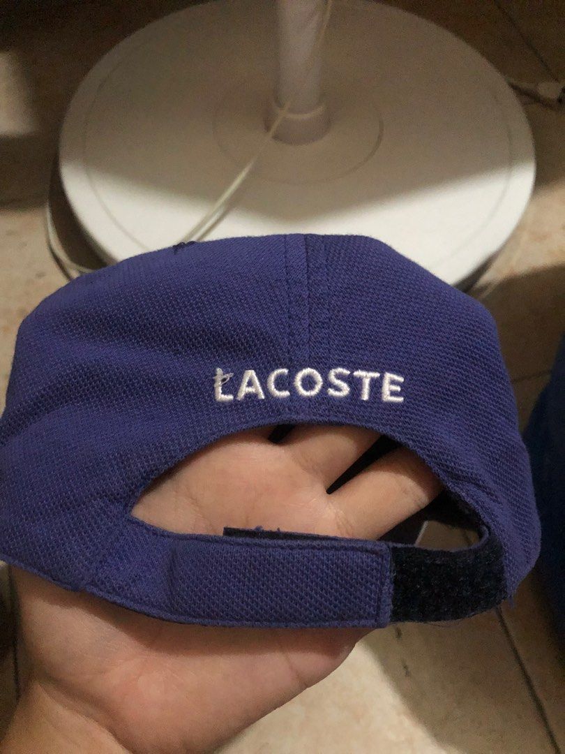 Lacoste purple cap on Carousell