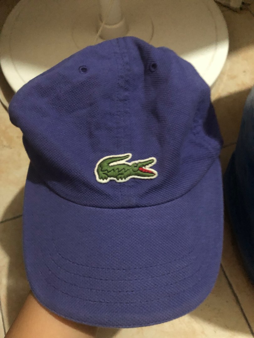 Lacoste purple cap on Carousell