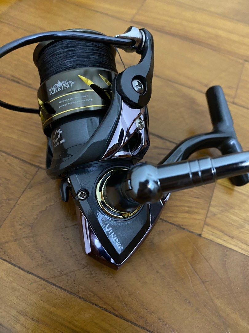 Ajiking black Bull 2000 reel, Sports Equipment, Fishing on Carousell
