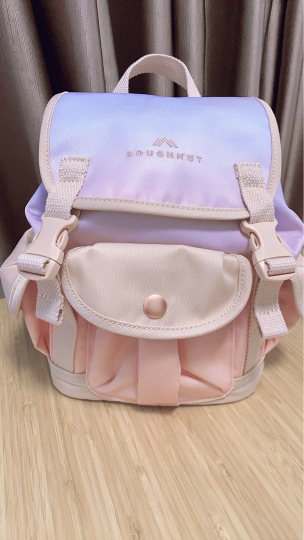 Doughnut lighthouse sunset Backpack, Women's Fashion, Bags & Wallets ...