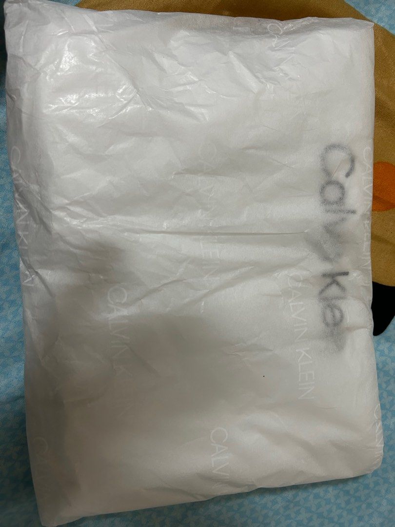 Calvin klein paper bag, Men's Fashion, Activewear on Carousell