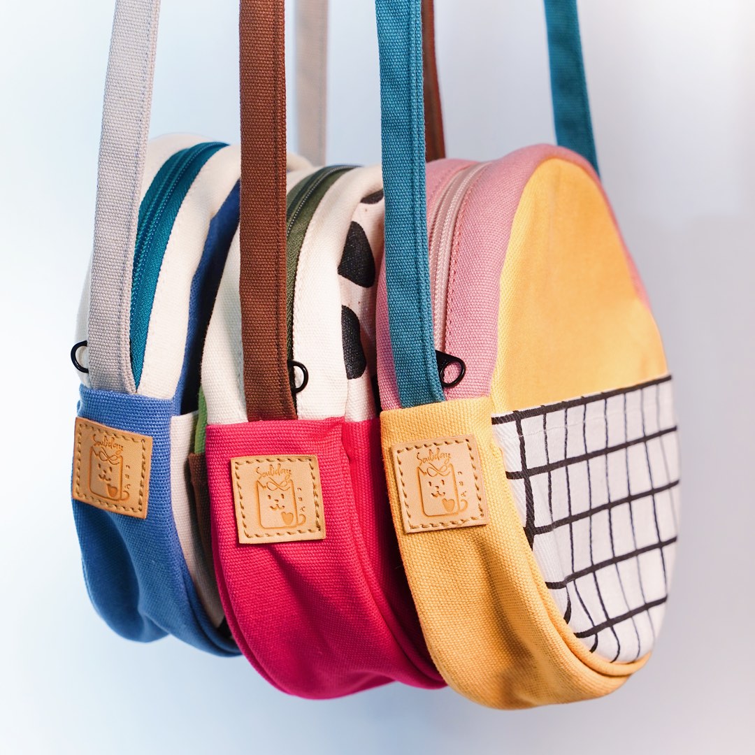 Dual Sided circle sling bag from Thailand. Limited edition from Souliday, Women's Fashion, Bags ...