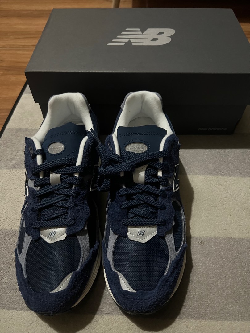 New Balance Protection Pack 2002R Navy on Carousell