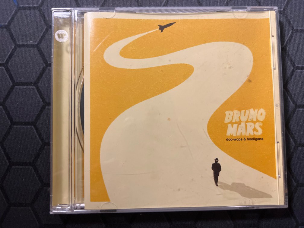CD BRUNO MARS, Hobbies & Toys, Music & Media, CDs & DVDs on Carousell