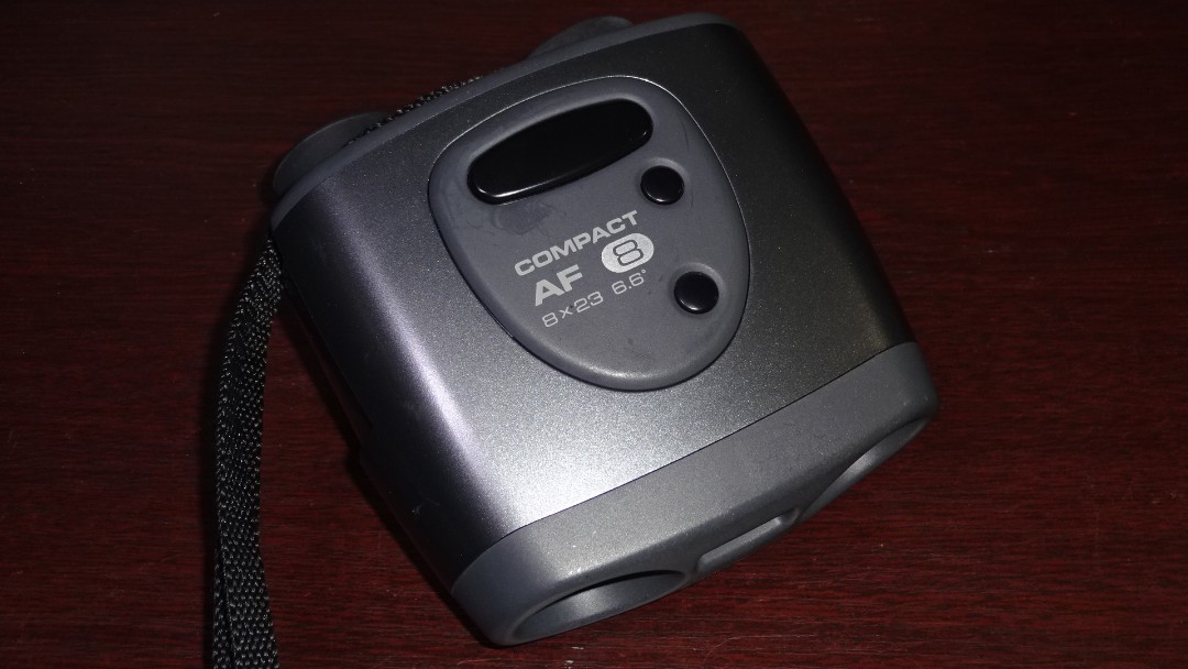 Minolta Compact AF 8 8x23 6.6° Binoculars with Auto Focus powered by 1x ...