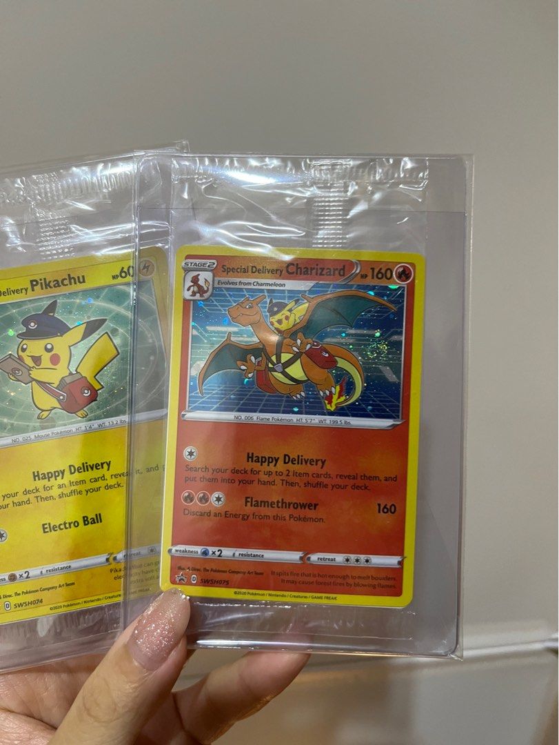 Pokémon Special Delivery Charizard & Pikachu Holo Swirl Set, Hobbies ...