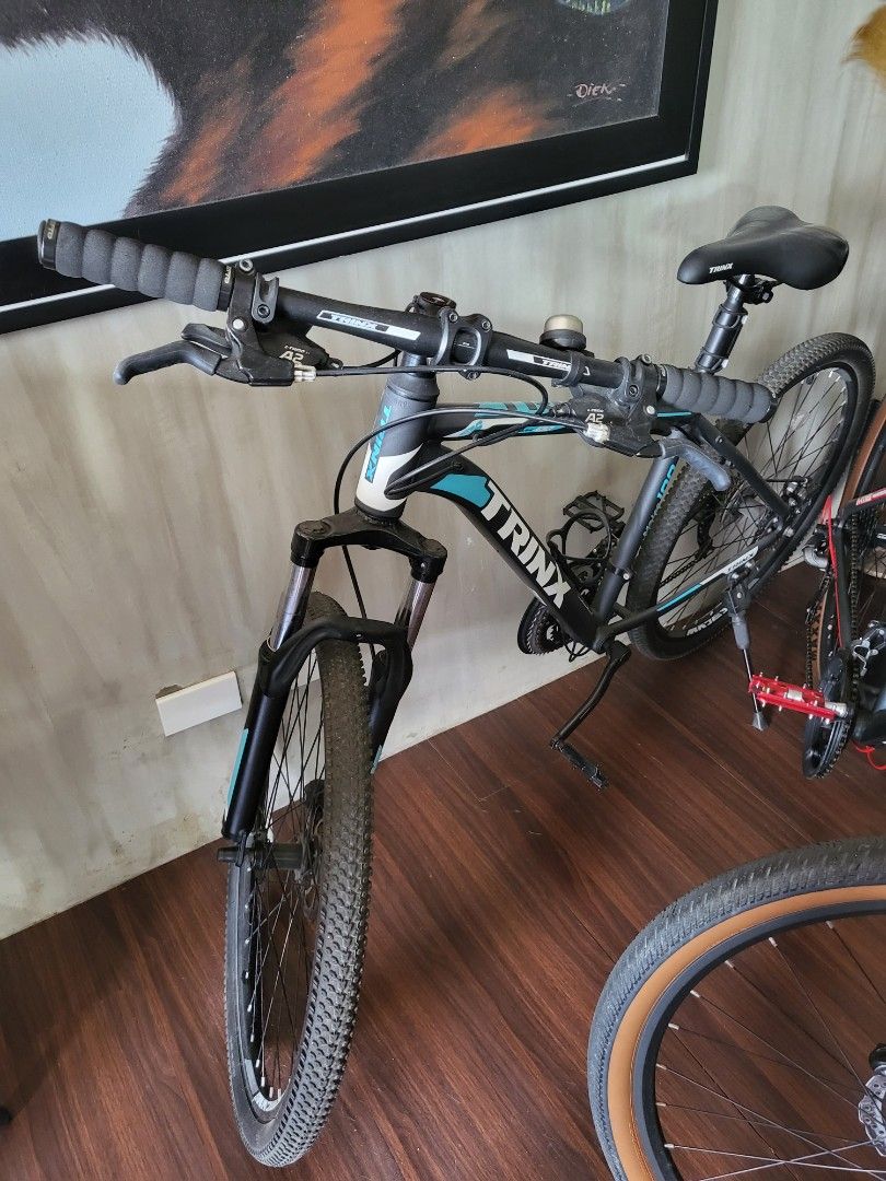 Trinx 26" mountain bike with spyder helmet on Carousell