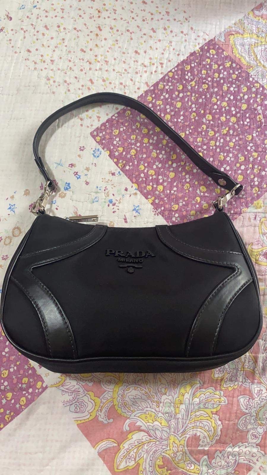Finding a new owner for Prada bag preowned yet excellent condition ...