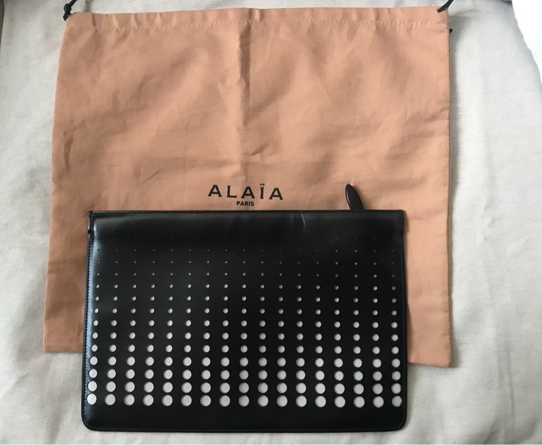 Alaia clutch laser cut leather , Luxury, Bags & Wallets on Carousell