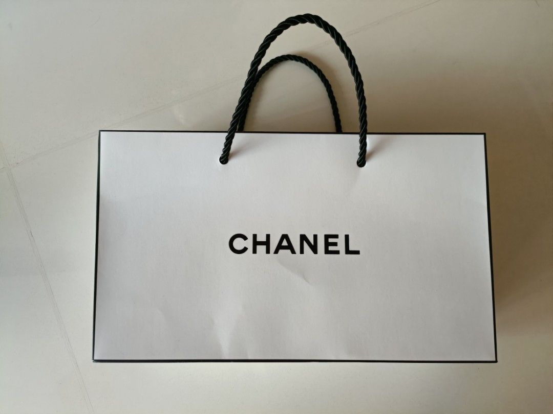 Chanel paper bag, Luxury, Bags & Wallets on Carousell