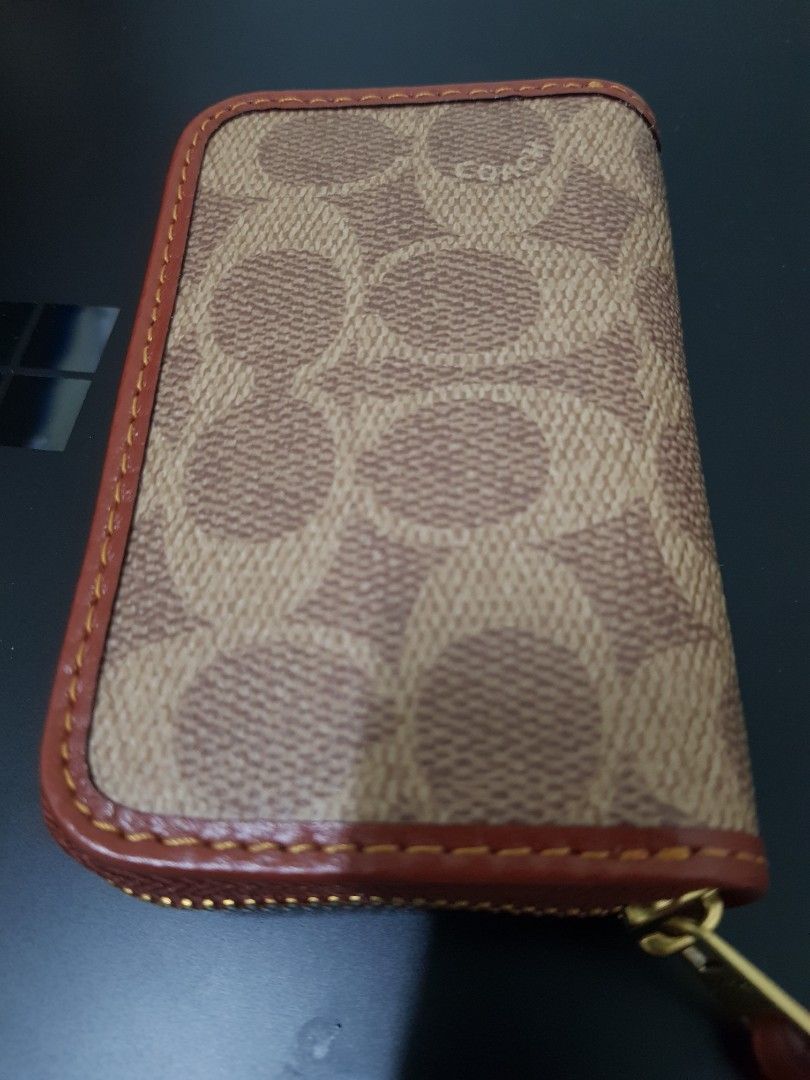 Coated Canvas Signature Small Zip Around, Women's Fashion, Bags ...