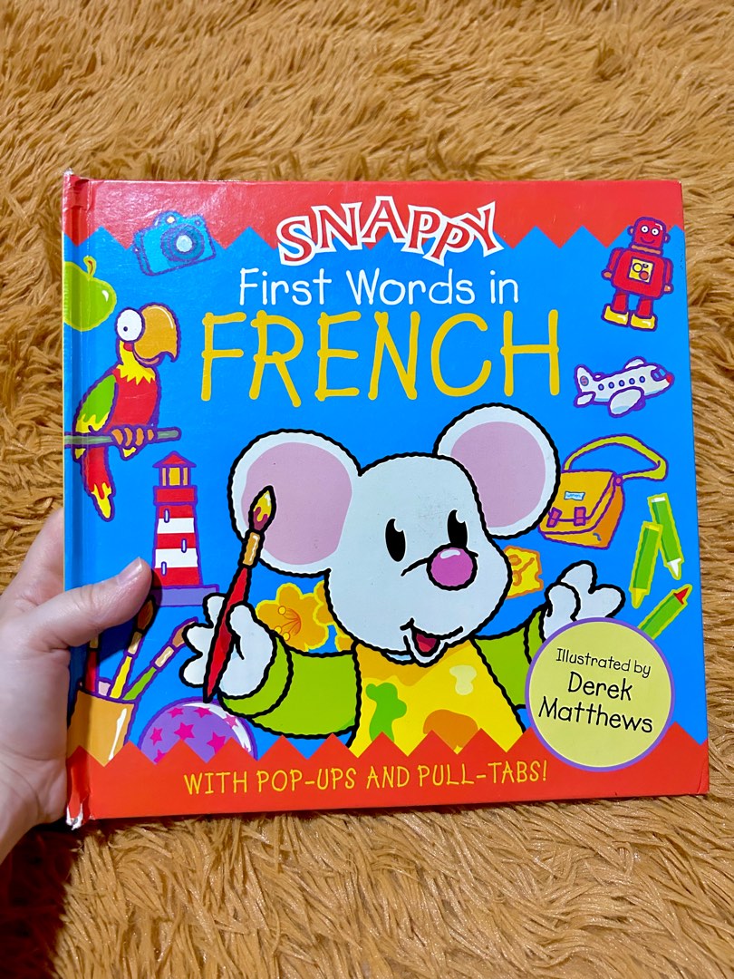 Snappy First Words in French Pop Up with flaps and pull the tabs on ...