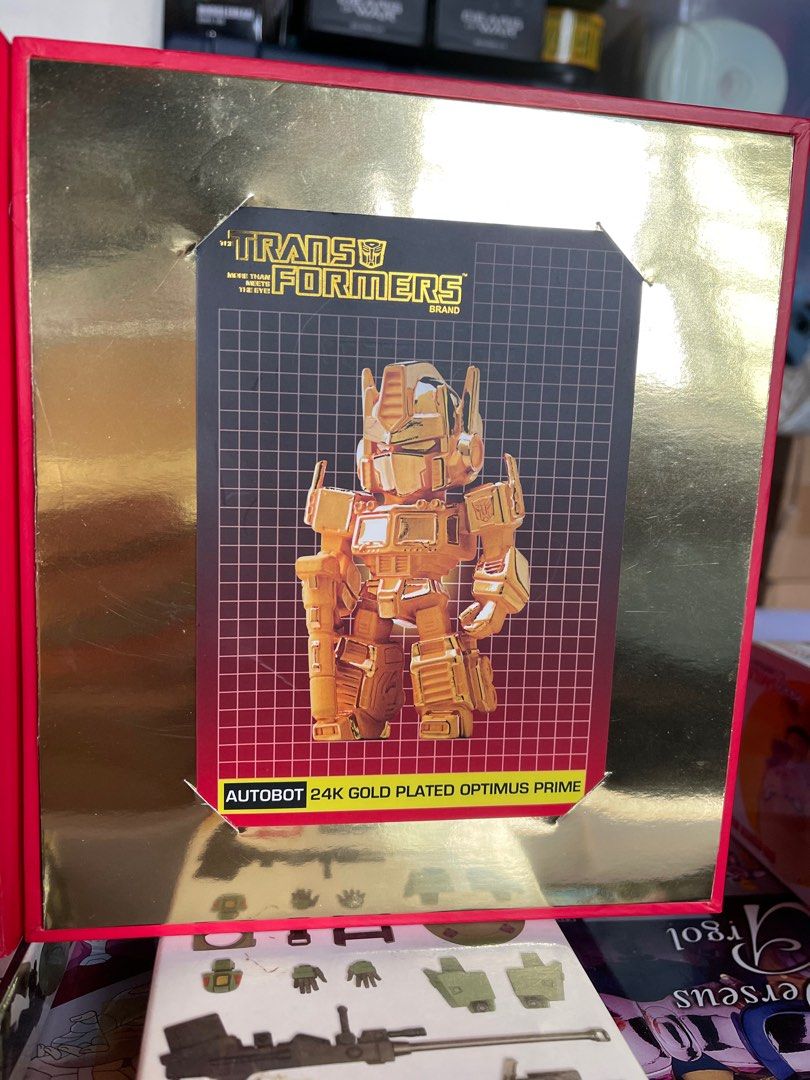 24K Gold Optimus Prime, Hobbies & Toys, Toys & Games on Carousell