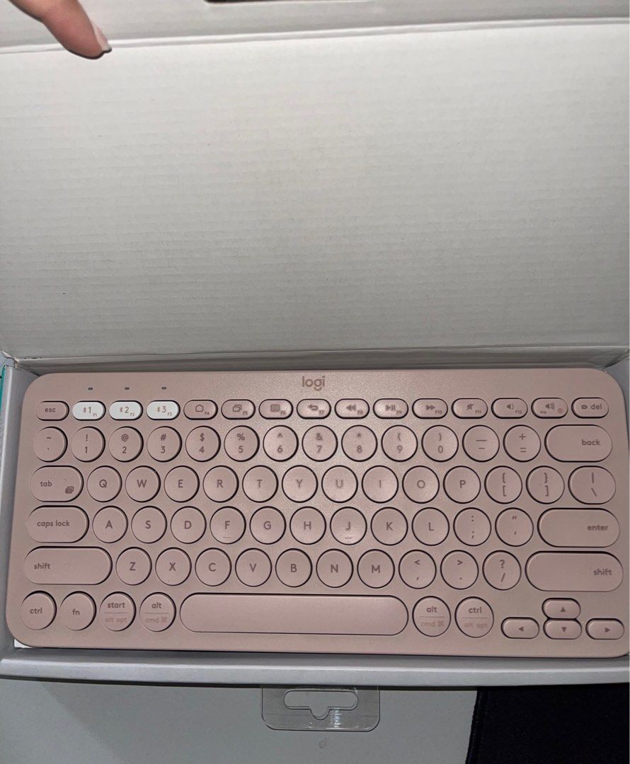 LOGITECH K380 keyboard in pink on Carousell