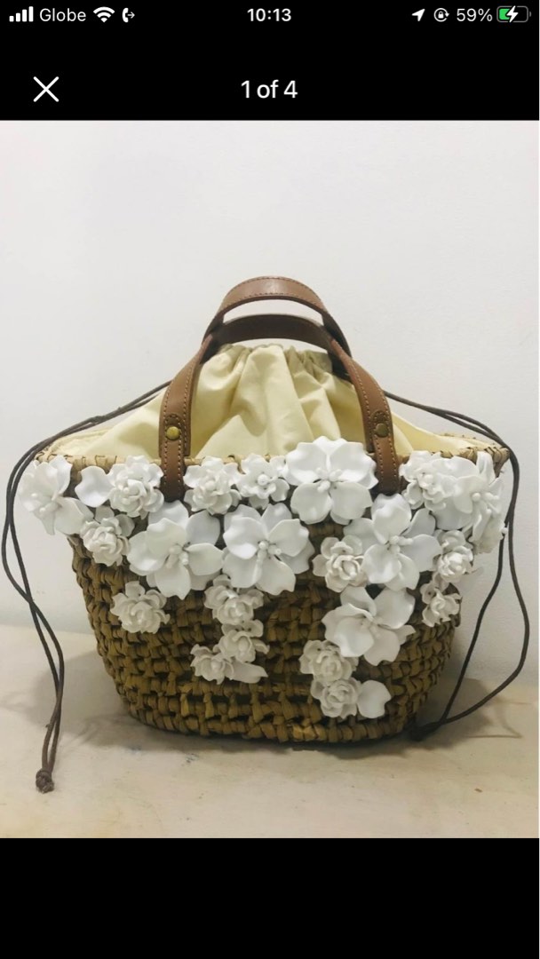Native with flowery bag on Carousell