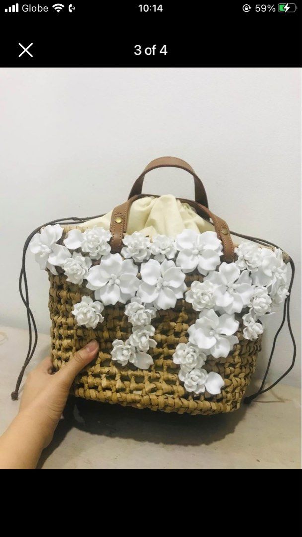 Native with flowery bag on Carousell