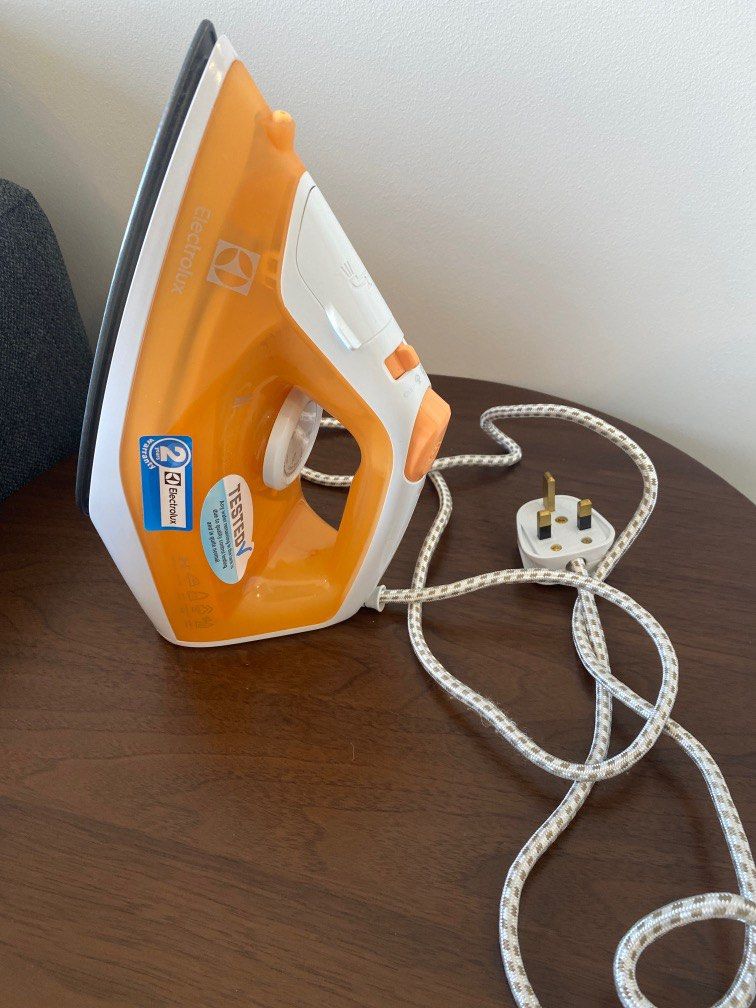 Orange Electrolux iron, TV & Home Appliances, Irons & Steamers on Carousell