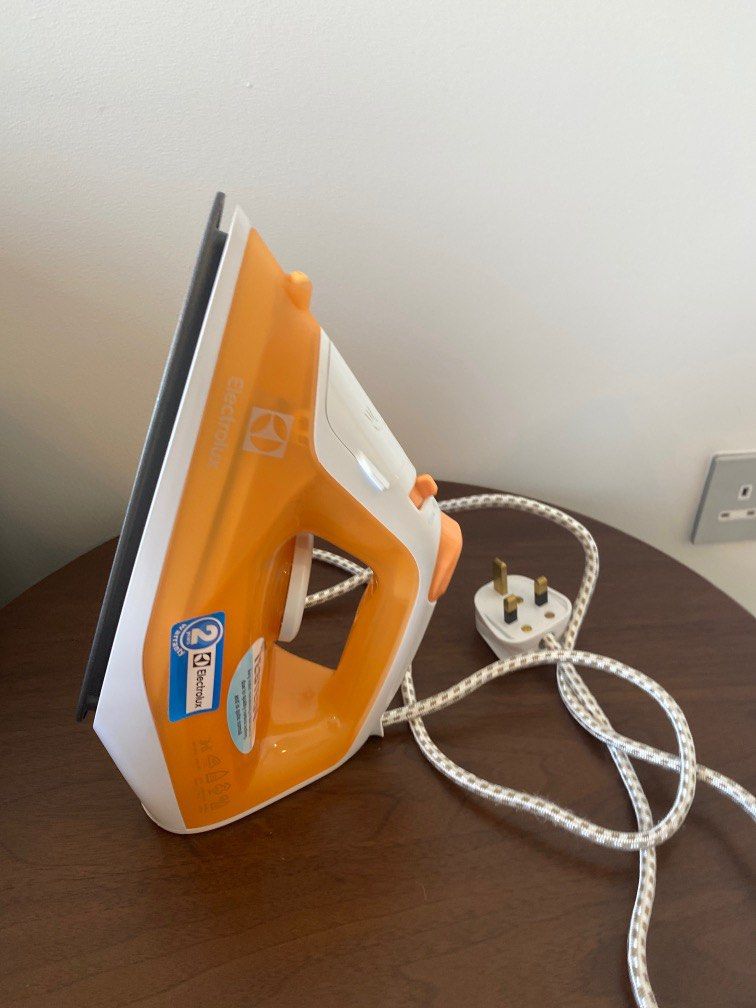 Orange Electrolux iron, TV & Home Appliances, Irons & Steamers on Carousell