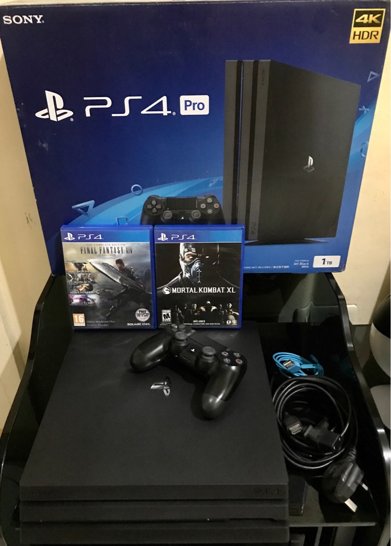 Ps4 Pro with Games and box, Video Gaming, Video Game Consoles ...