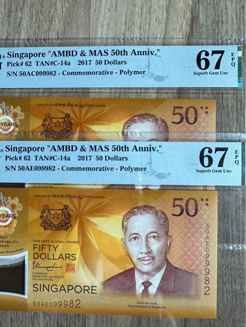 CIA Commemorative Identical Serial Number 099982 both identical grade ...