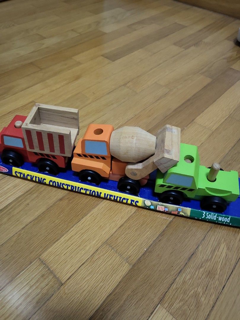Melissa & Doug - Stacking Construction Vehicles, Hobbies & Toys, Toys & Games on Carousell