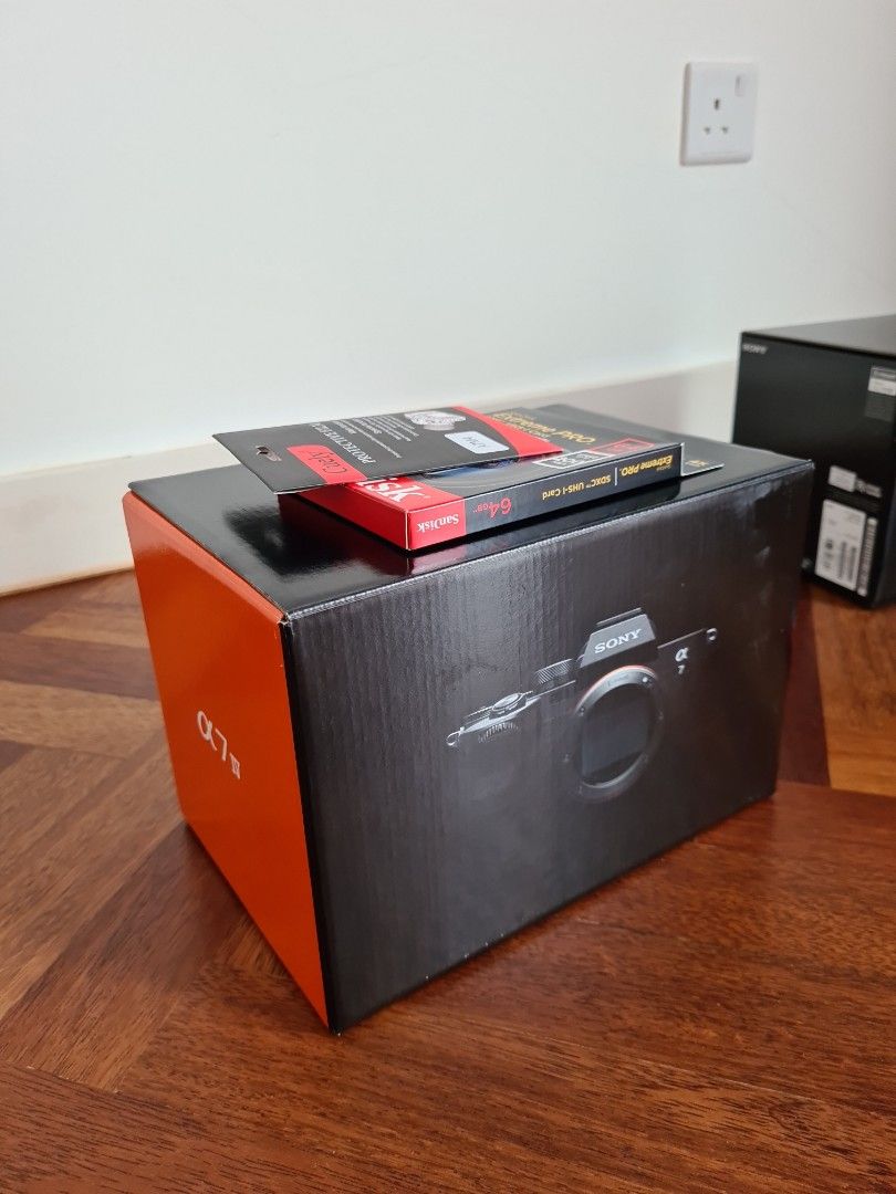 Sony A7IV sealed box (free 64GB SD Card), Photography, Cameras on Carousell
