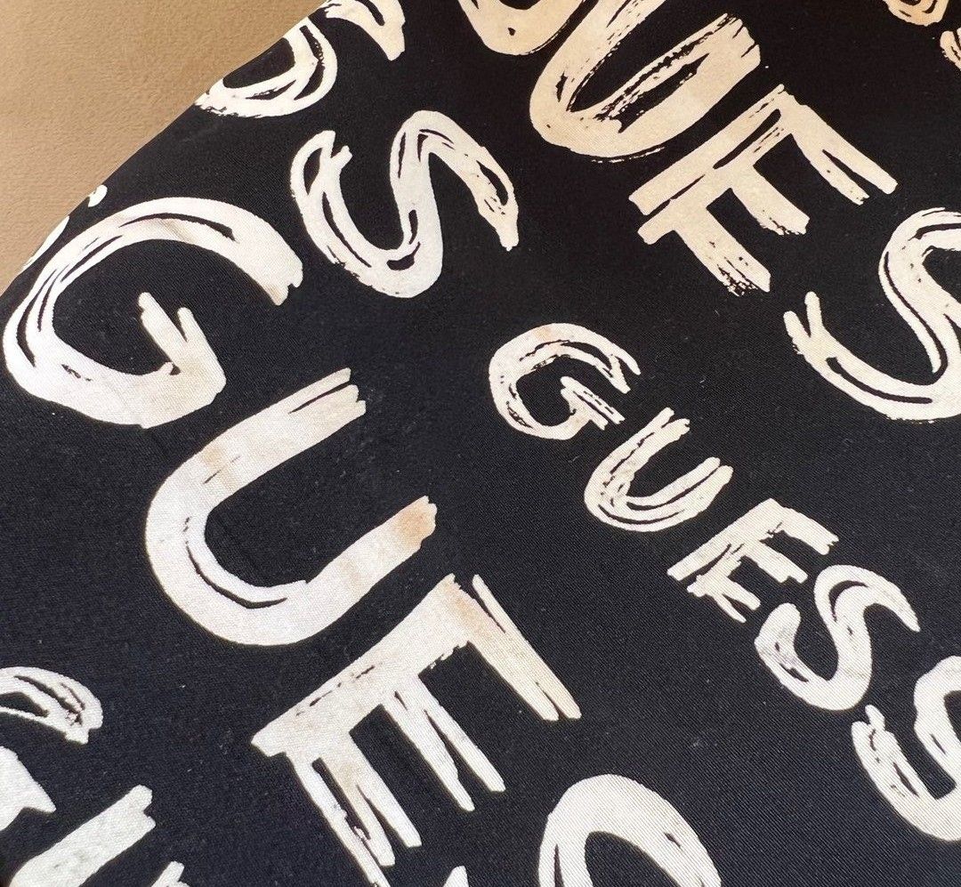 Guess all over print logo design bag on Carousell