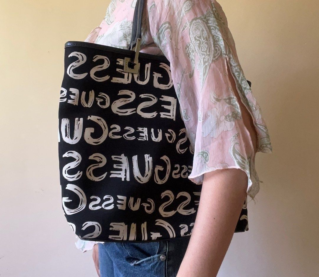 Guess all over print logo design bag on Carousell