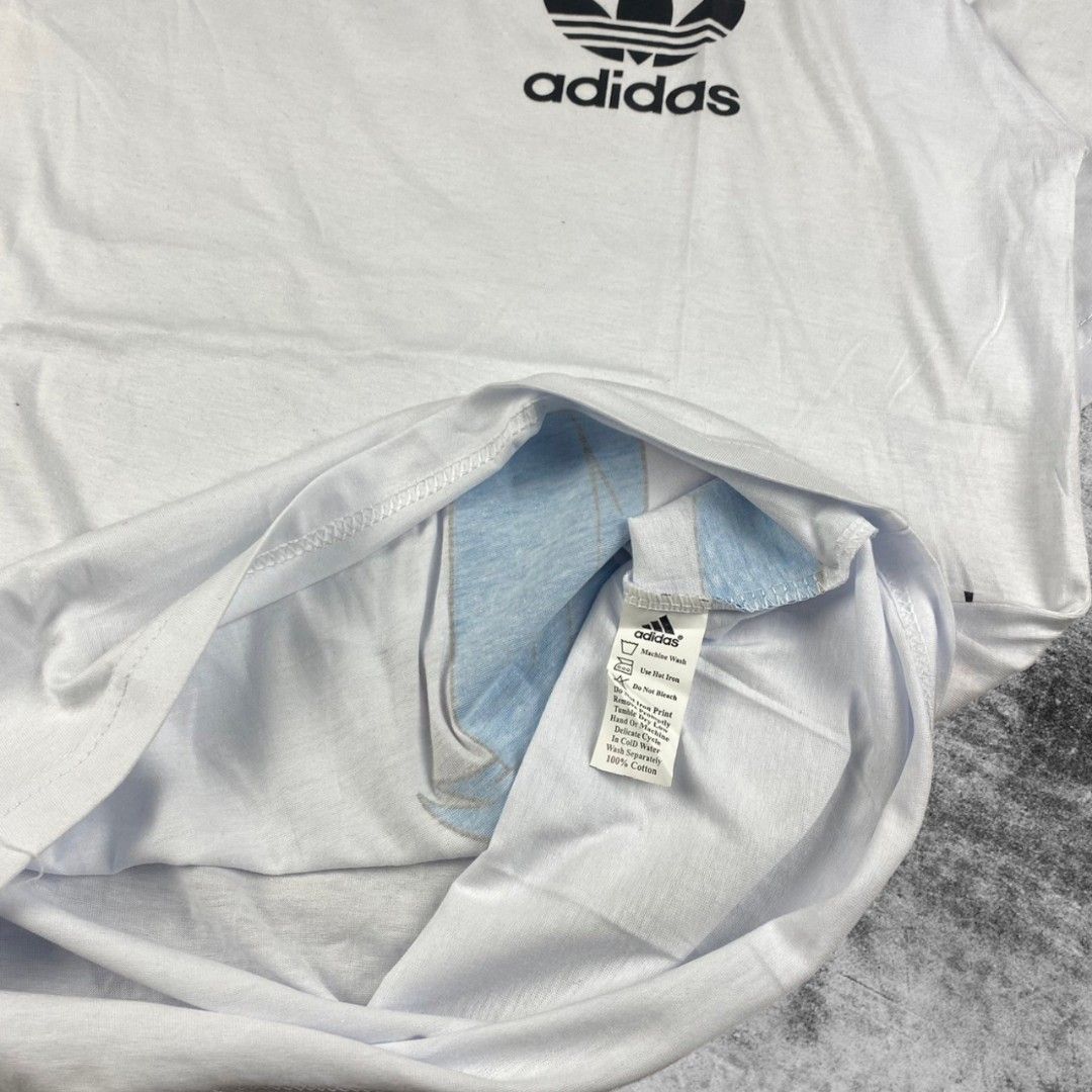 Kaos Adidas Tom And Jerry Putih, Fesyen Pria, Pakaian , Atasan di Carousell