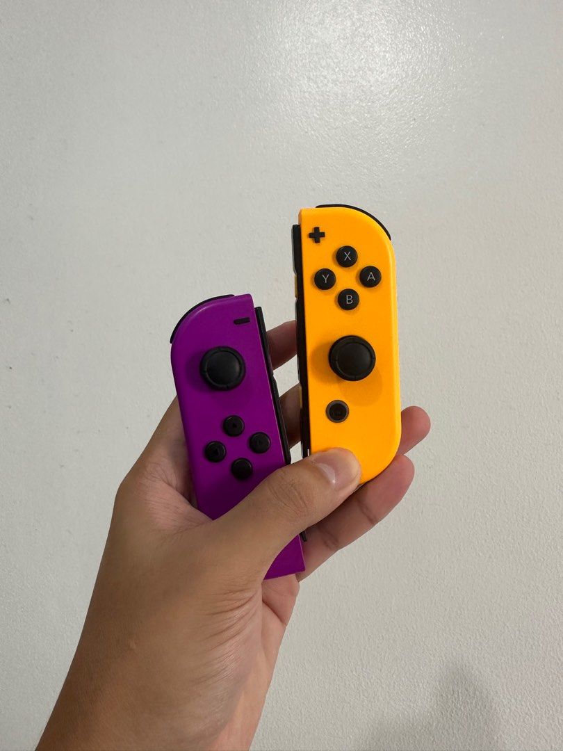 Nintendo Switch Neon Purple / Neon Orange Joycons on Carousell