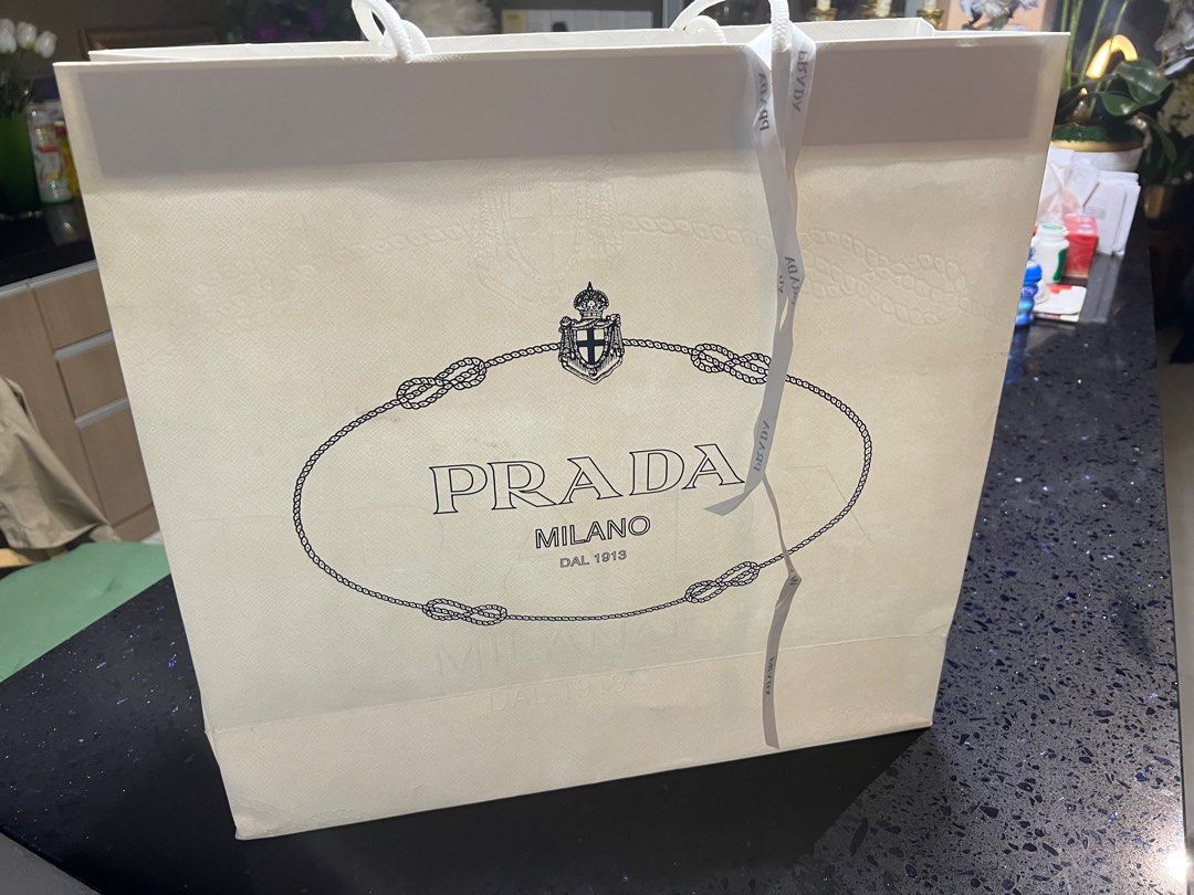 Prada paper bag, Luxury, Bags & Wallets on Carousell