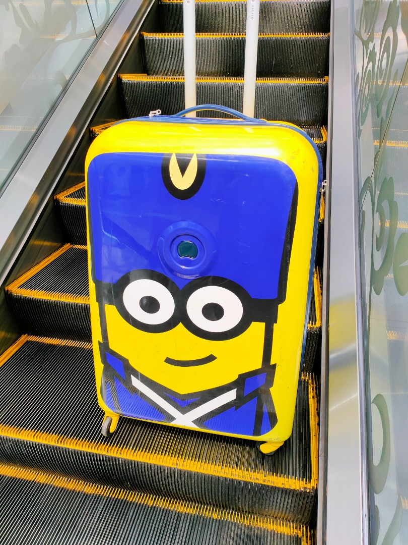 Extra large Delsey x Minions 30kg max size luggage with Secure Zip 77cm ...