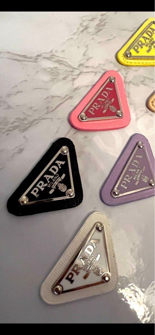 Prada pin brooch on Carousell