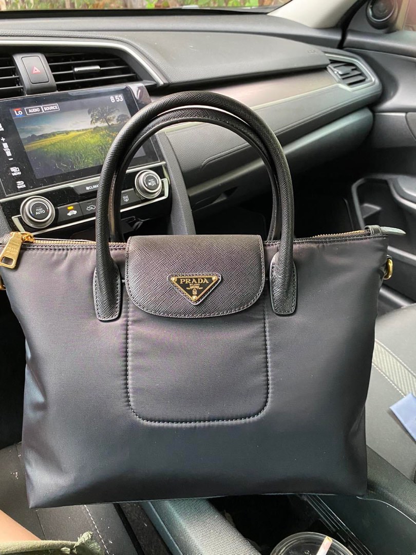 Prada tote bag with sling, Luxury, Bags & Wallets on Carousell