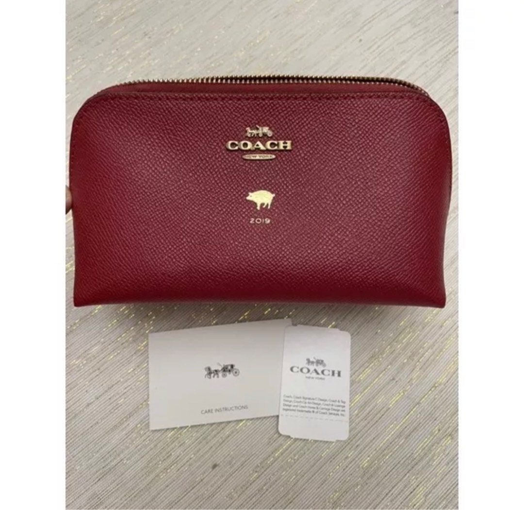 Coach Year of the pig leather pouch on Carousell