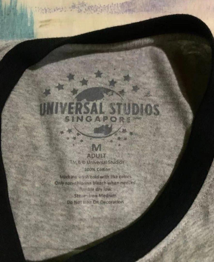 kaos universal studios, Fesyen Pria, Pakaian , Atasan di Carousell
