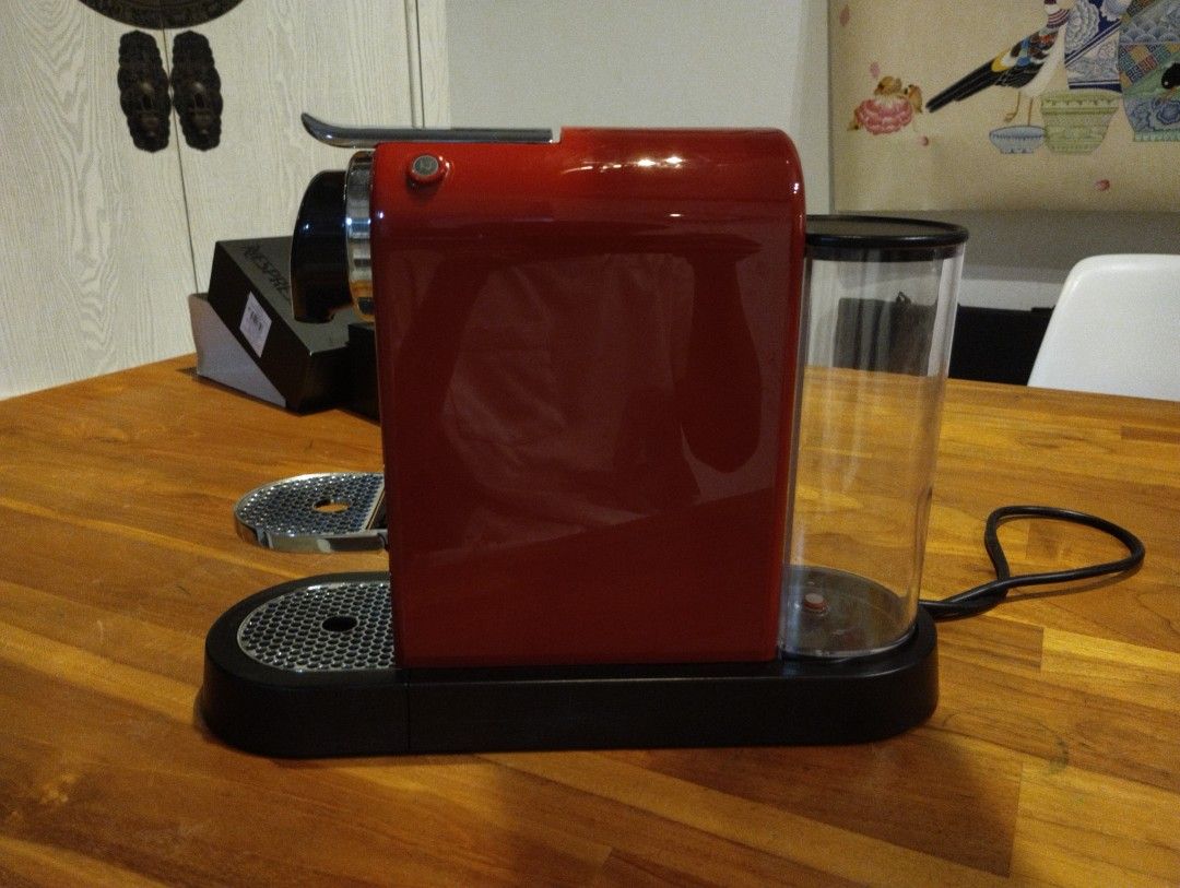 Nespresso coffee machine + View set and box with some capsules, TV ...